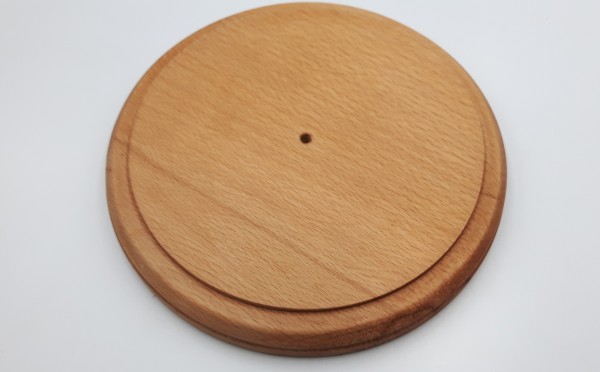Large round hardwood pattress , manufactured from African oak