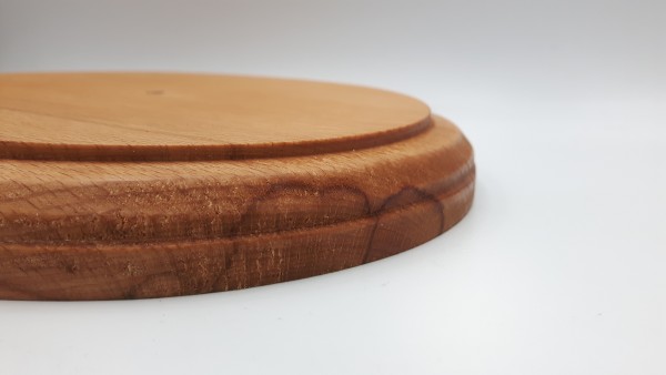 Large round hardwood pattress , manufactured from African oak