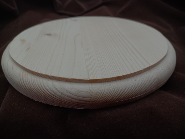 Large round softwood pattress manufactured from pine