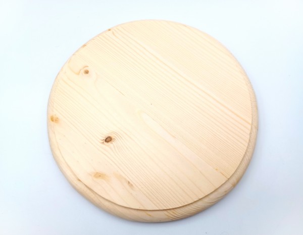 Large round softwood pattress manufactured from pine